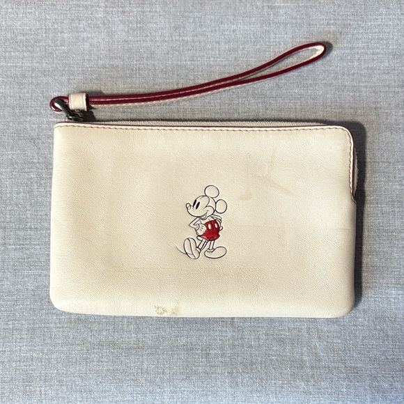 Disney | Bags | Disney X Coach Cream Wristlet With Red Mickey Accent ...